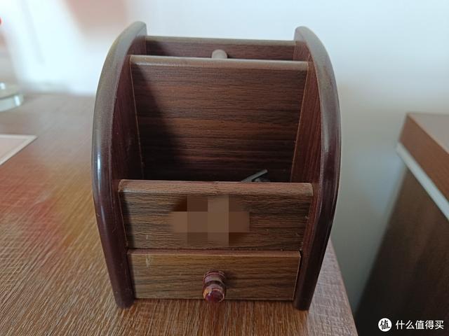 A small storage box that effectively organizes space, where keys ...