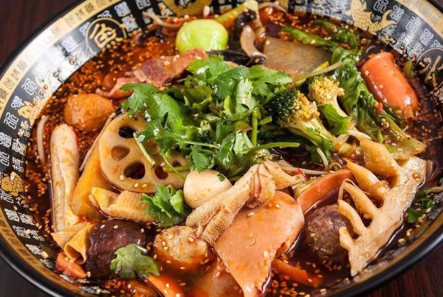 The few "essential dishes" of Mala Tang were placed "on the side" by ...