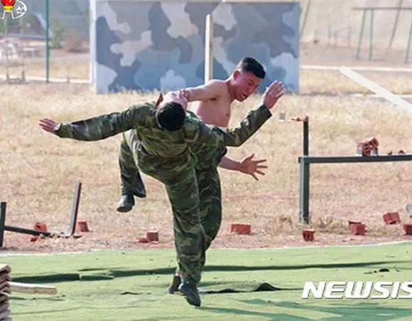 North Korea's mysterious men in black, Kim Jong-un's top bodyguards ...