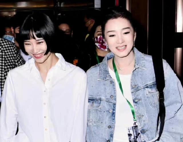 "Gong Li" has an outstanding temperament. She wears a denim jacket with ...