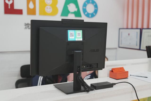 Have you ever seen an office computer with a touch screen on the back ...